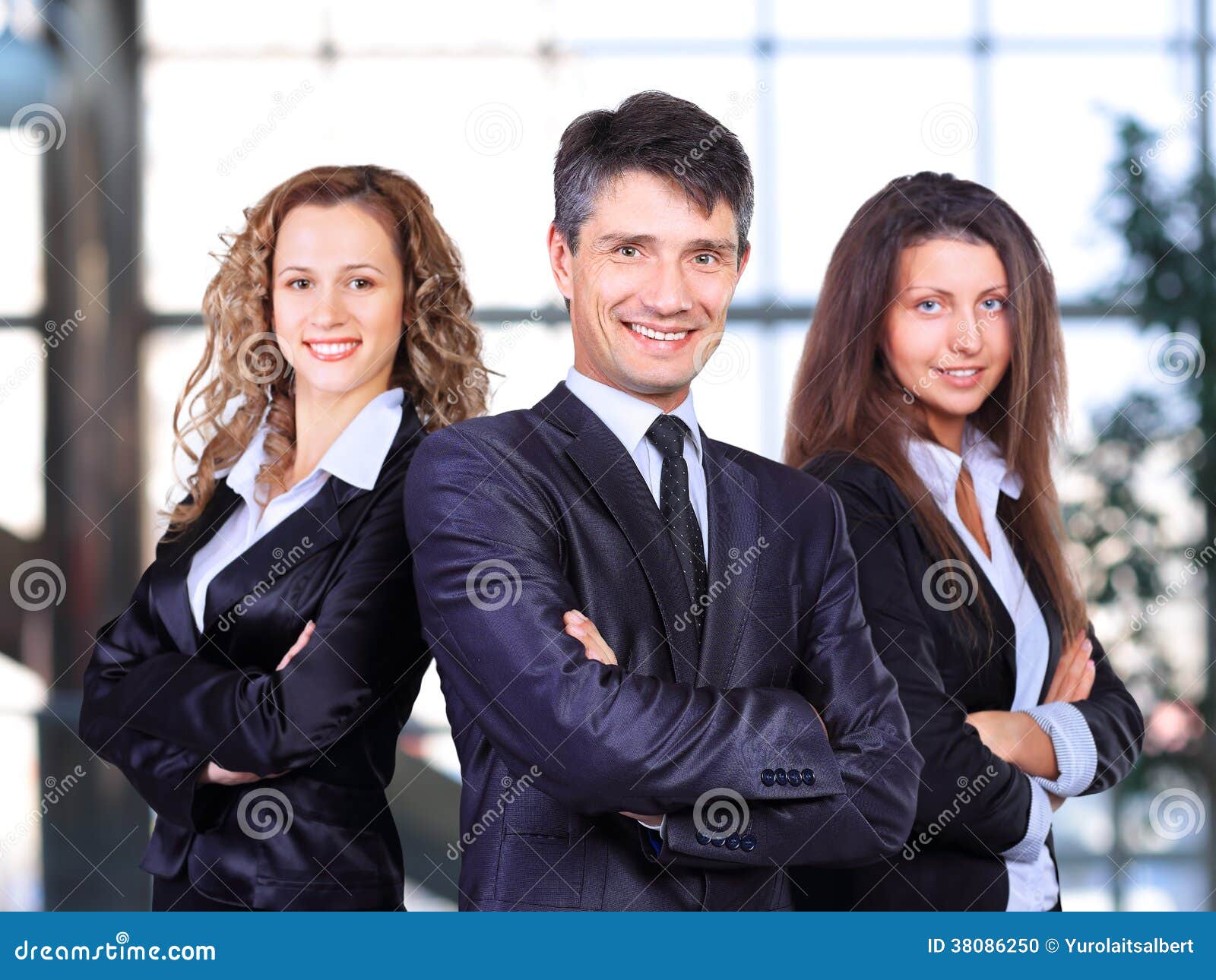 A Business Team with Pretty Leader Stock Photo - Image of boss, group ...