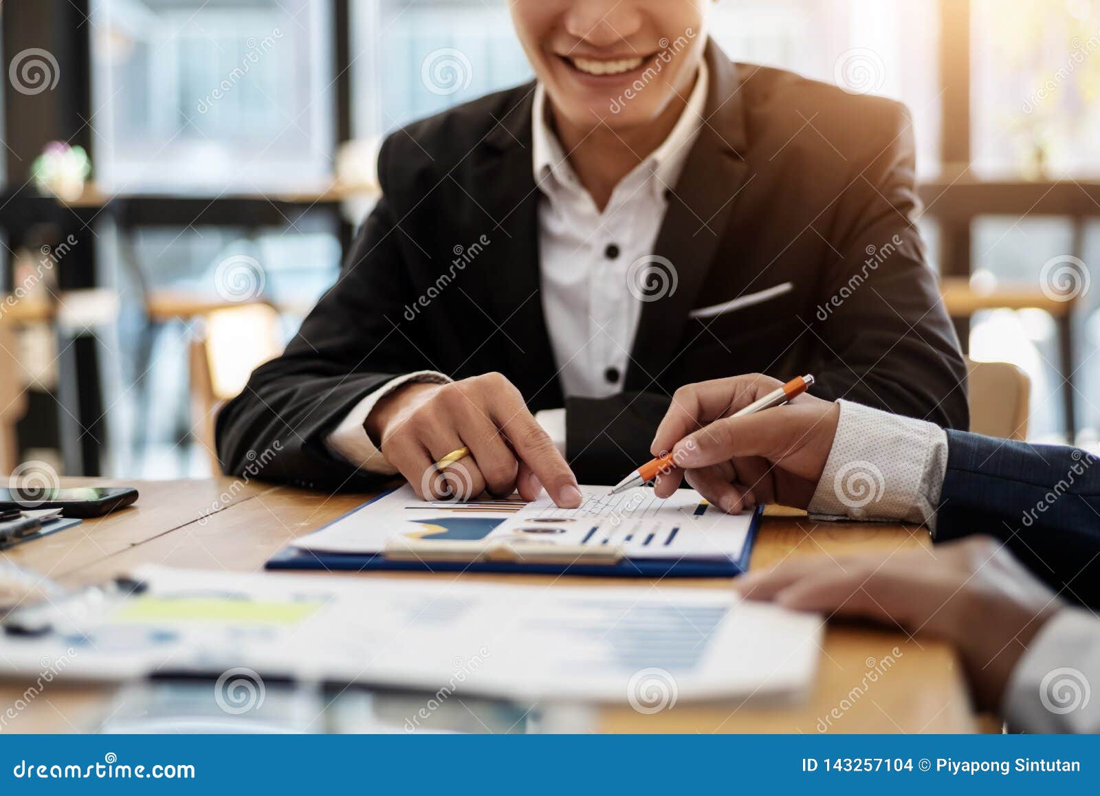 Business Team Professionals Working Analyzing Data with Financial ...