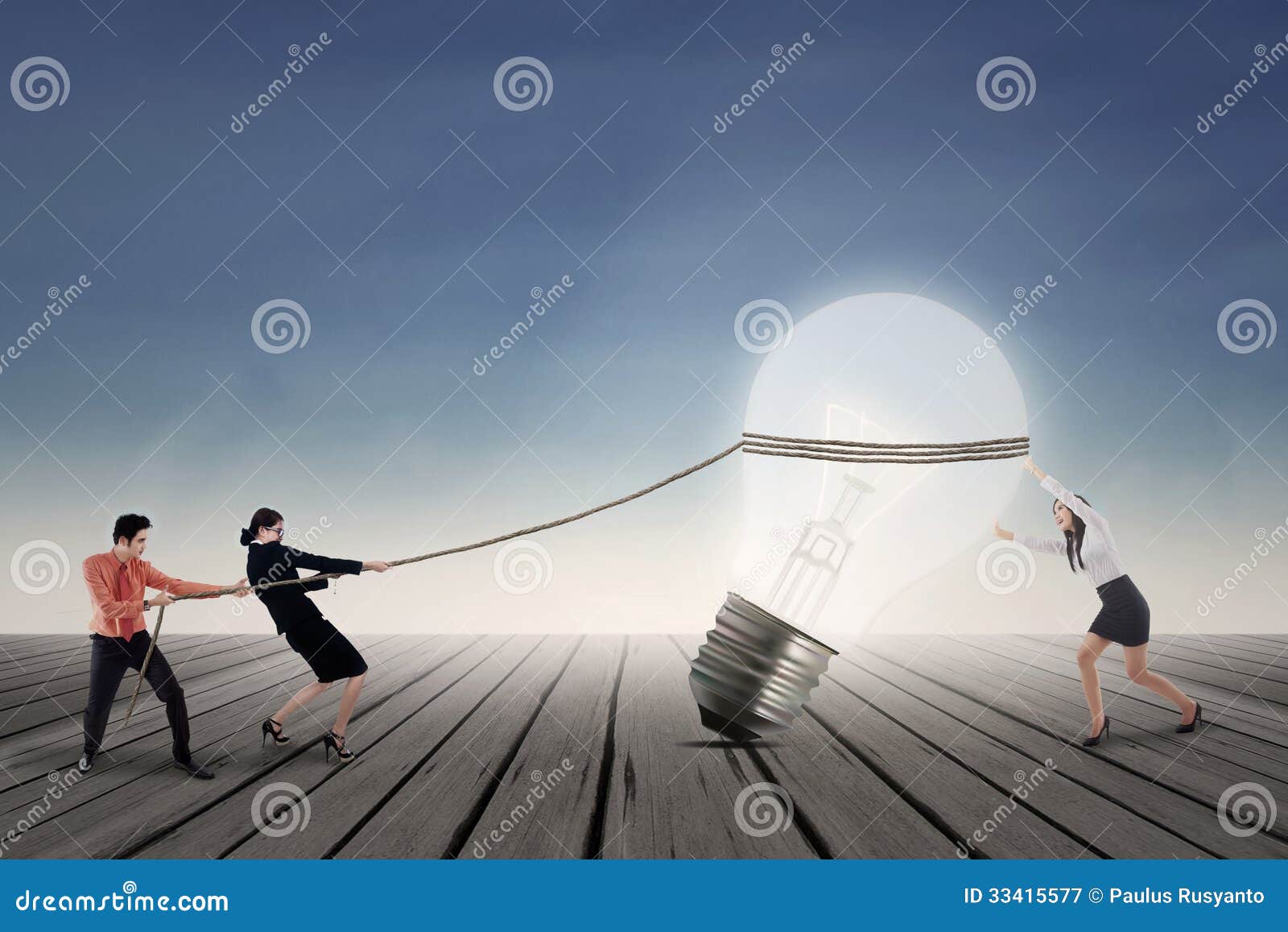 Business Team Pulling Lamp Outdoor Stock Image - Image of asian, light ...