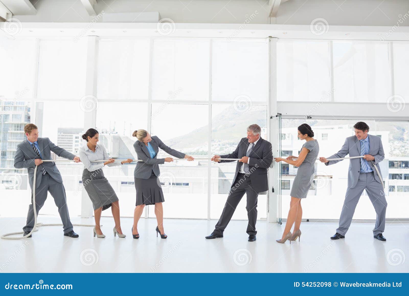 Team Pulling Line Together. Tug Of War Royalty-Free Stock Photography ...