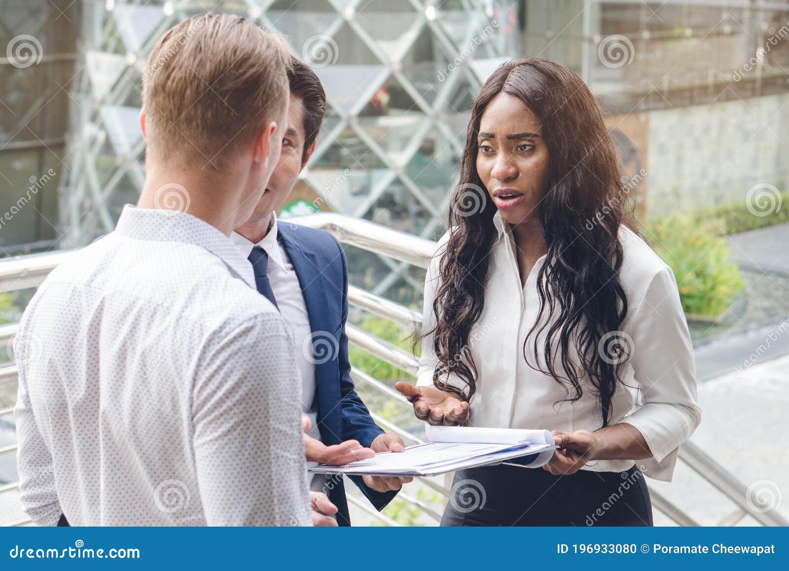 Business Team are Reviewing Document Presentation. Multicultural ...