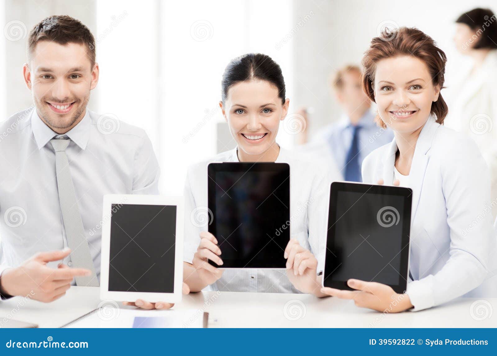 Business Team Showing Tablet Pcs in Office Stock Photo - Image of happy ...