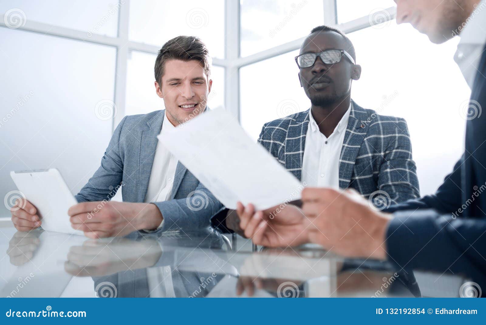 Business Team Sitting at the Desk. Stock Photo - Image of businessman ...
