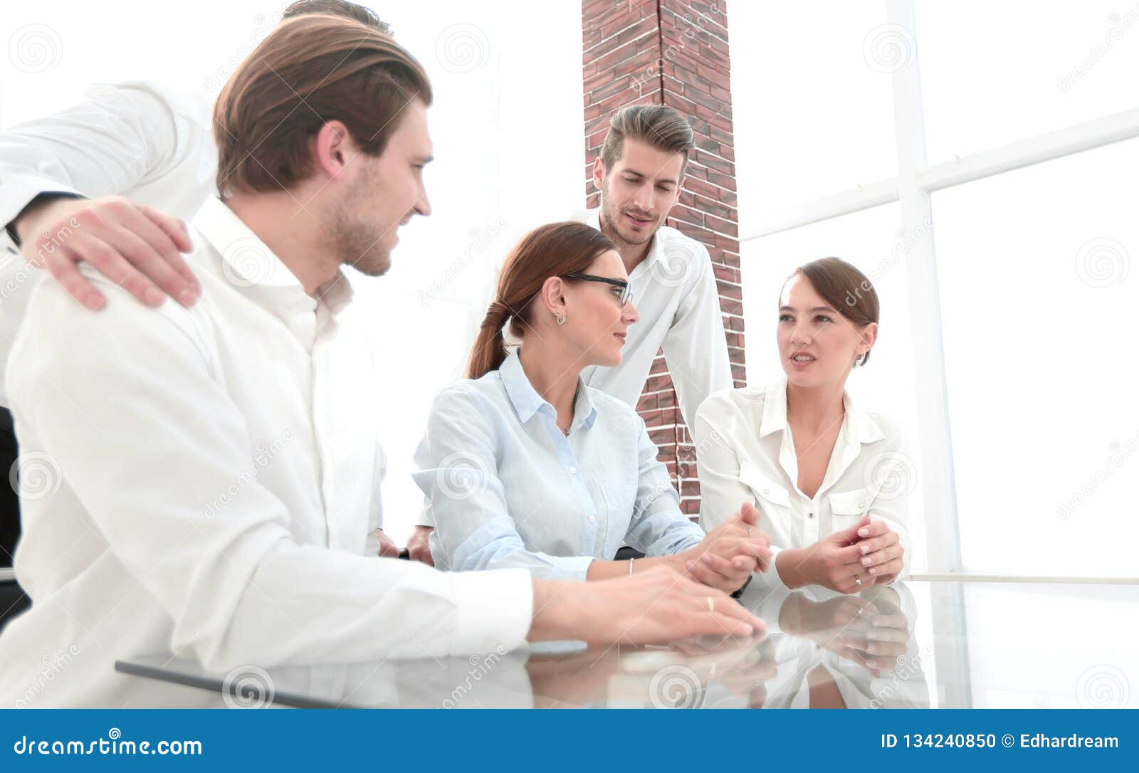 Business Team Sitting at a Table in the Conference Room Stock Photo ...