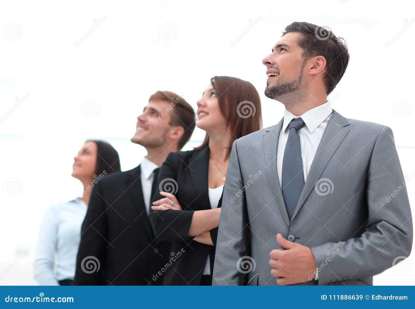 Business Team Standing One Behind the Other and Looking Forward Stock ...