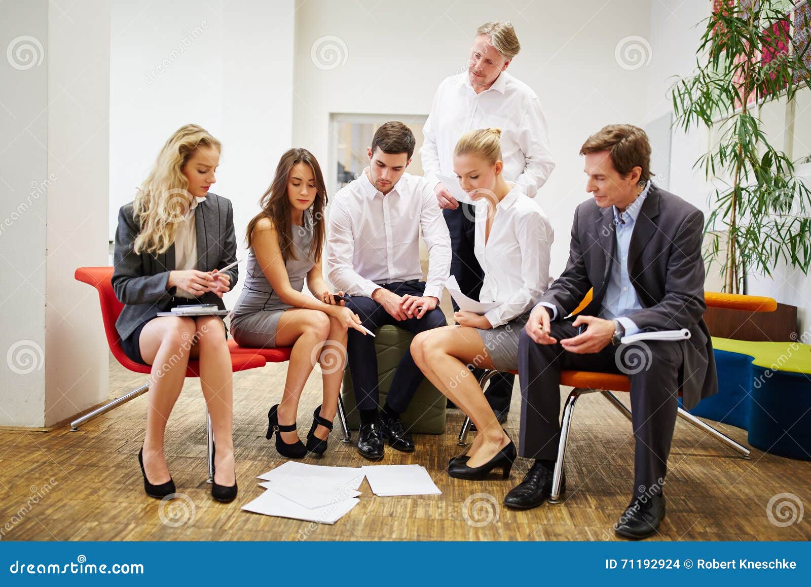 Business Team during a Strategy Meeting Stock Photo - Image of document ...