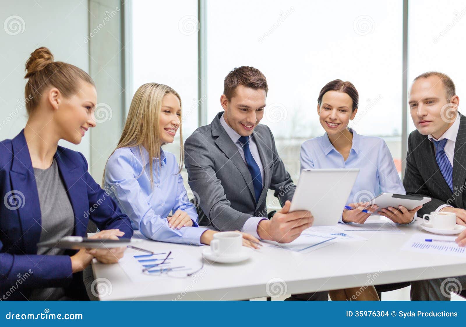 Business Team with Tablet Pc Having Discussion Stock Photo - Image of ...