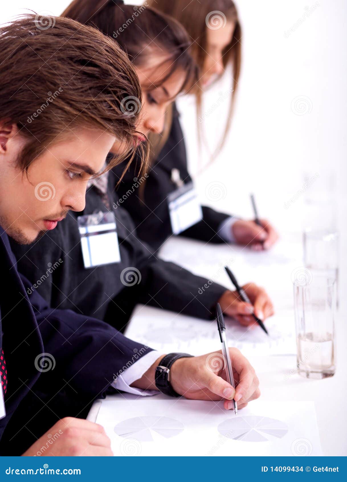 Business team taking notes stock photo. Image of group - 14099434