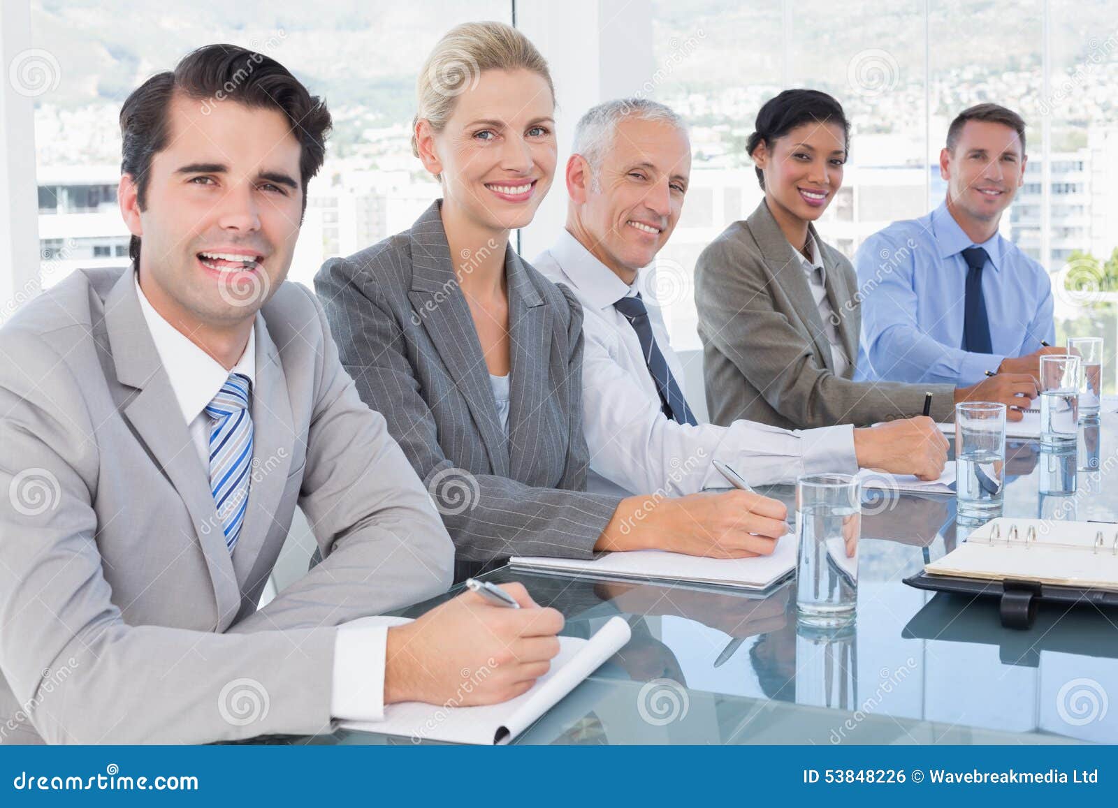Business Team Taking Notes during Conference Stock Photo - Image of ...