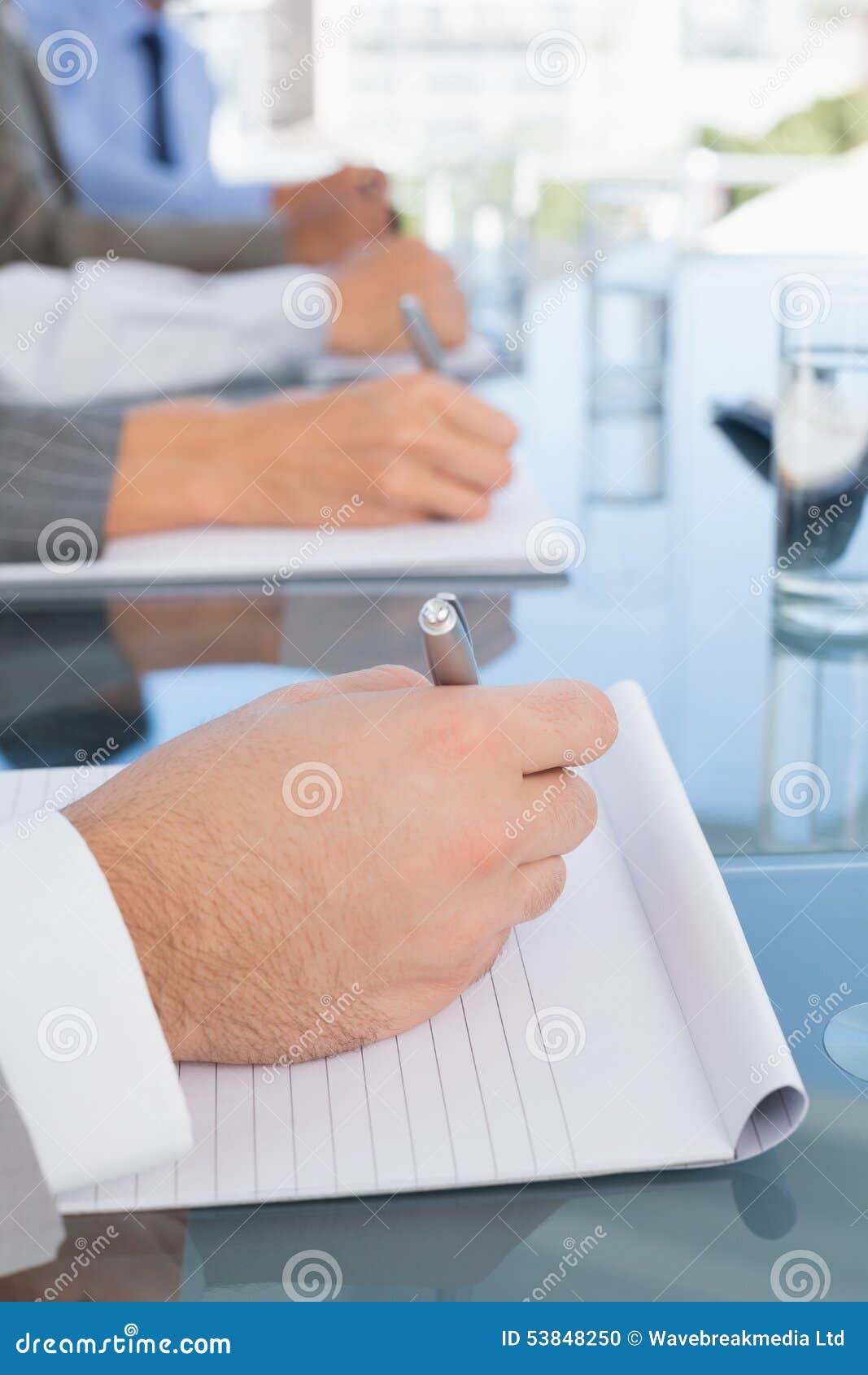 Business Team Taking Notes during Conference Stock Photo - Image of ...
