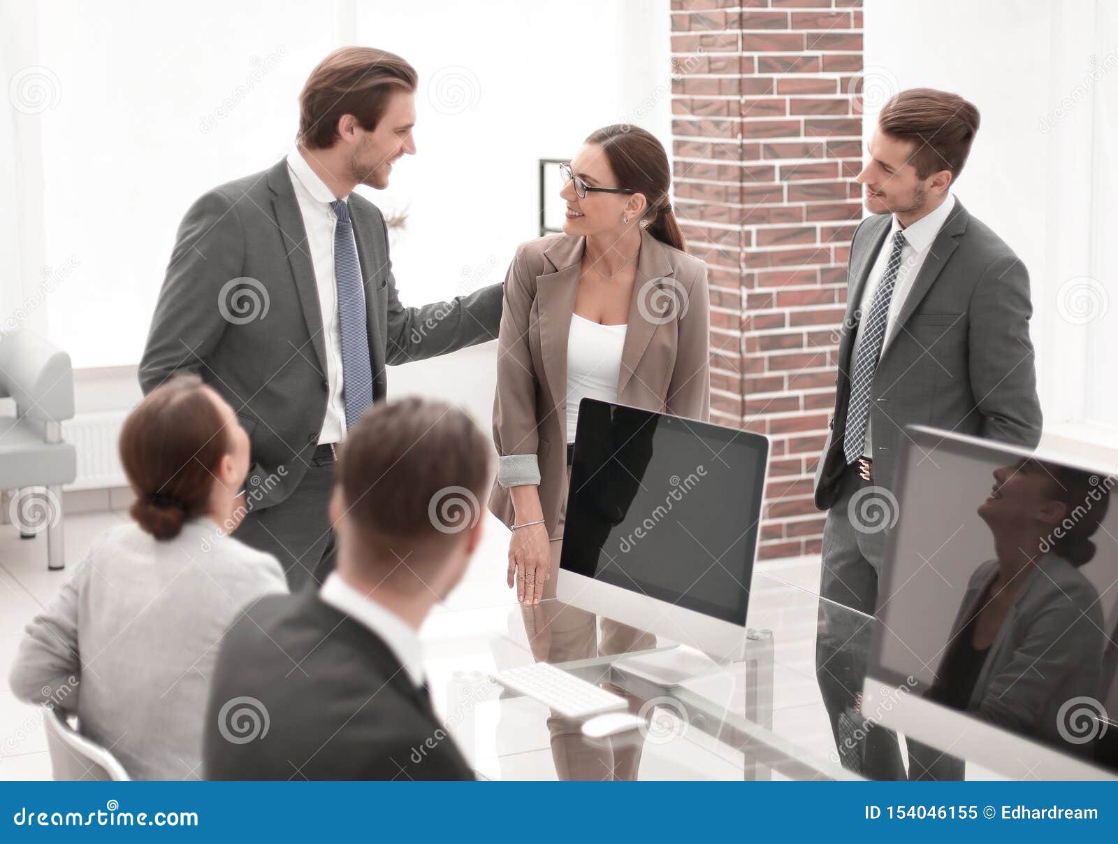 Business Team Talking Near the Desktop Stock Image - Image of ...