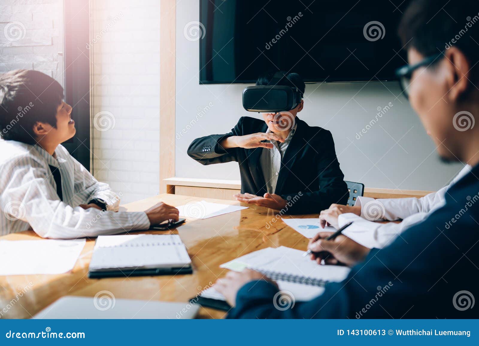 Business Team Testing Virtual Reality VR Headset Technology with ...