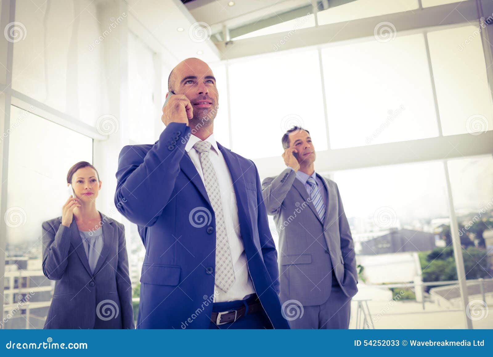 Business Team on Their Phones Stock Image - Image of jacket, connection ...
