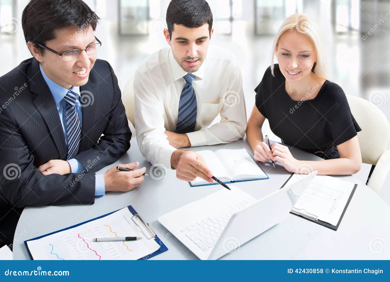 A business team stock photo. Image of communication, discussing - 42430858