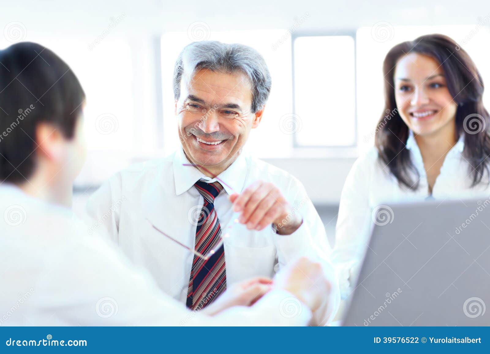 A Business Team of Three Sitting in Office Stock Photo - Image of adult ...