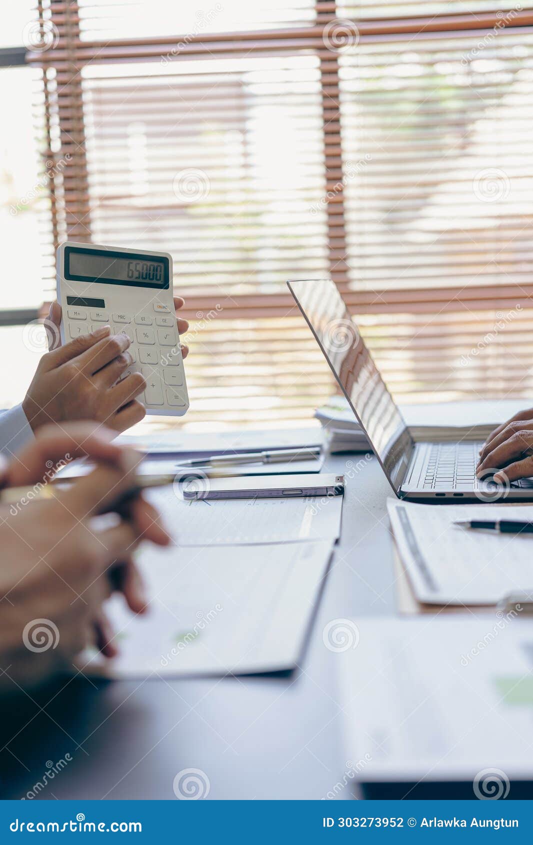 Business Team Two Managers Work on Accounting Documents and the Team ...
