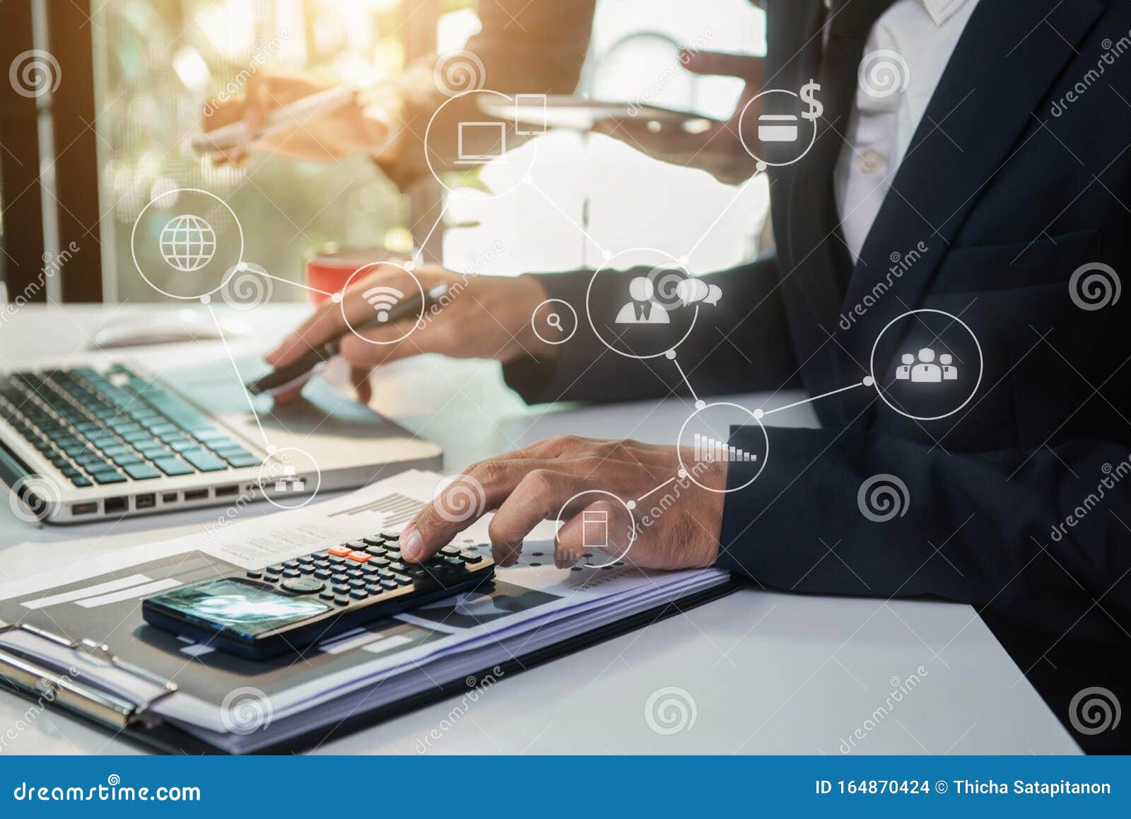 Business Team Using a Calculator To Calculate the Numbers of Statistic ...