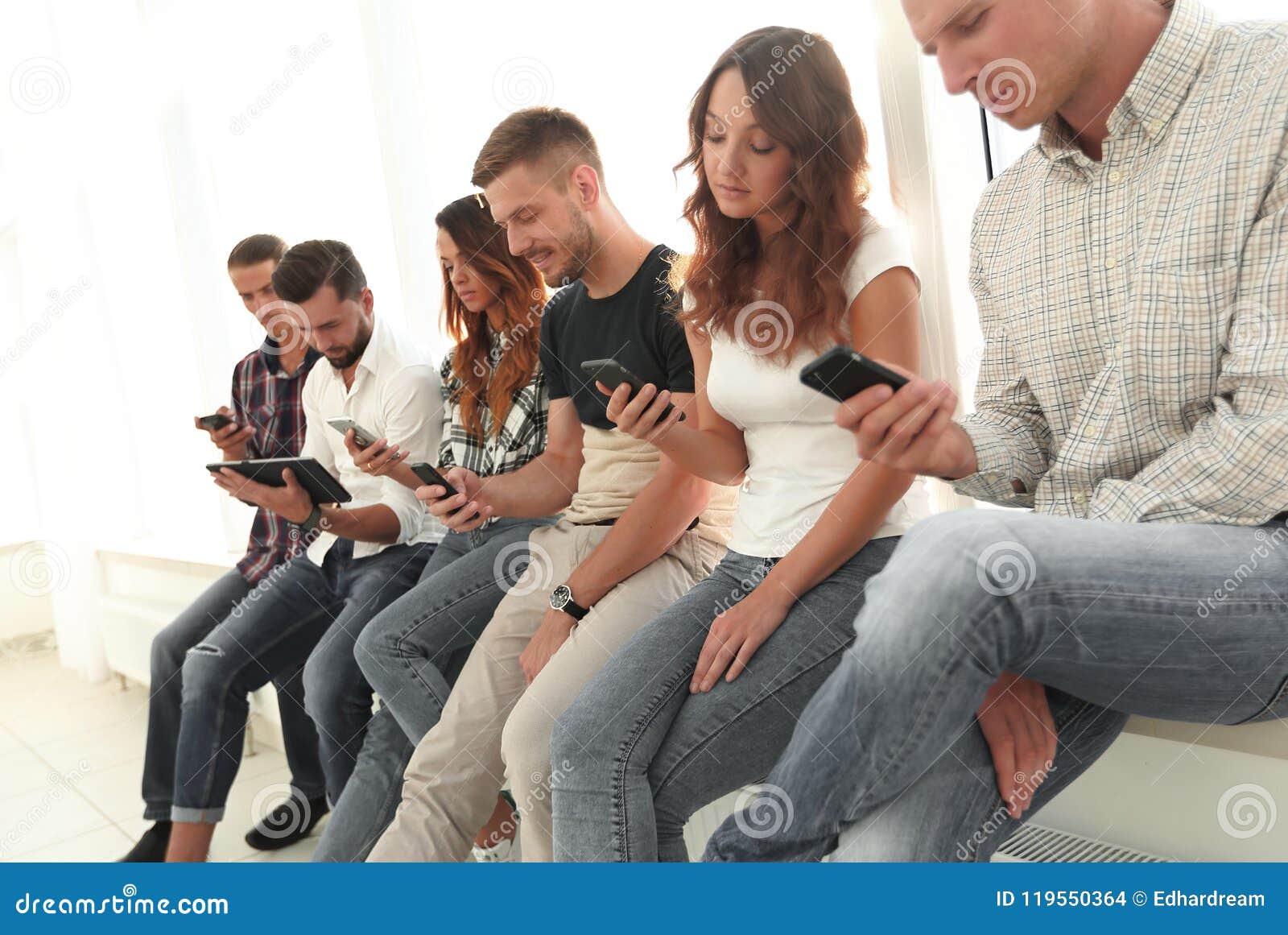 Business Team Using a Mobile Device Stock Photo - Image of laptop ...