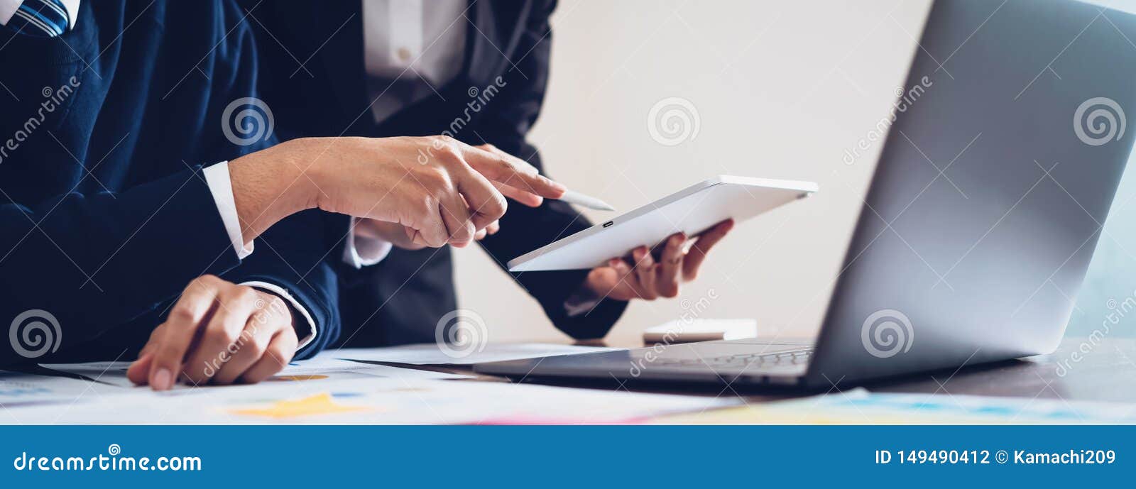 Business Team Using Tablet and Laptop Computer To Work in the Office ...