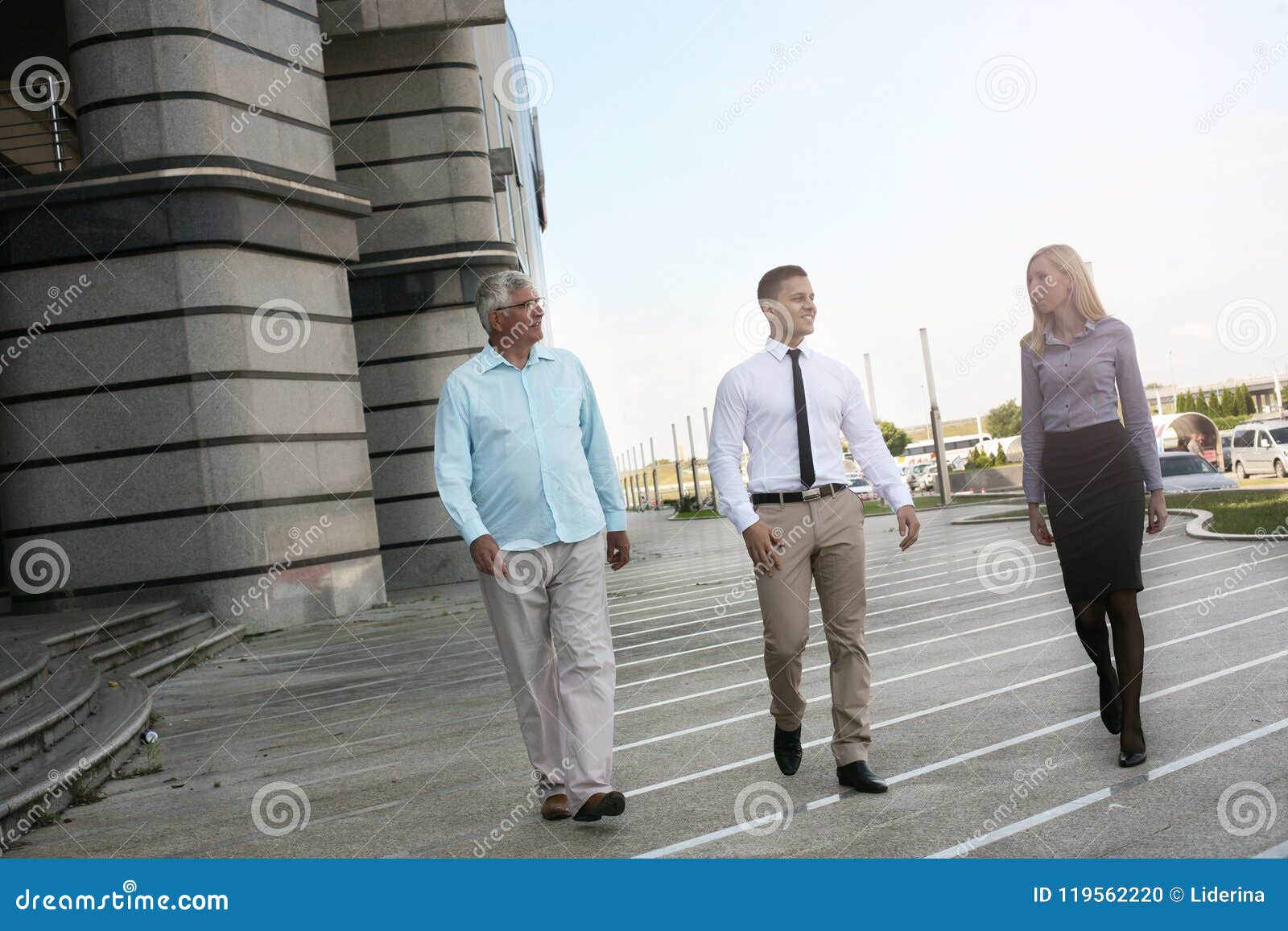 Business Team Walking and Having Conversation. Stock Photo - Image of ...