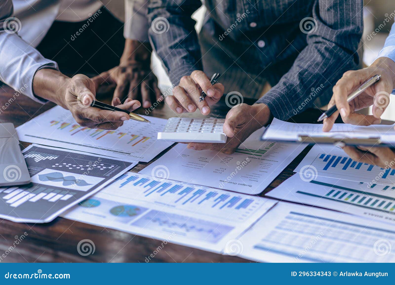 Business Team Working they are Analyzing Financial Reports and Using ...