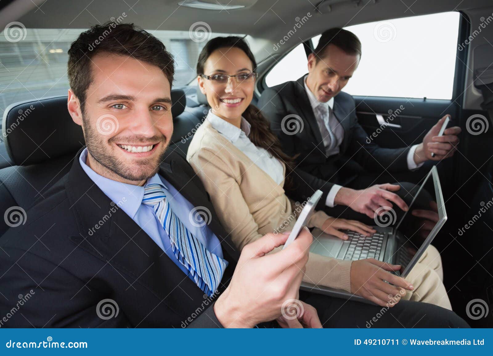 Business Team Working in the Back Seat Stock Image - Image of caucasian ...