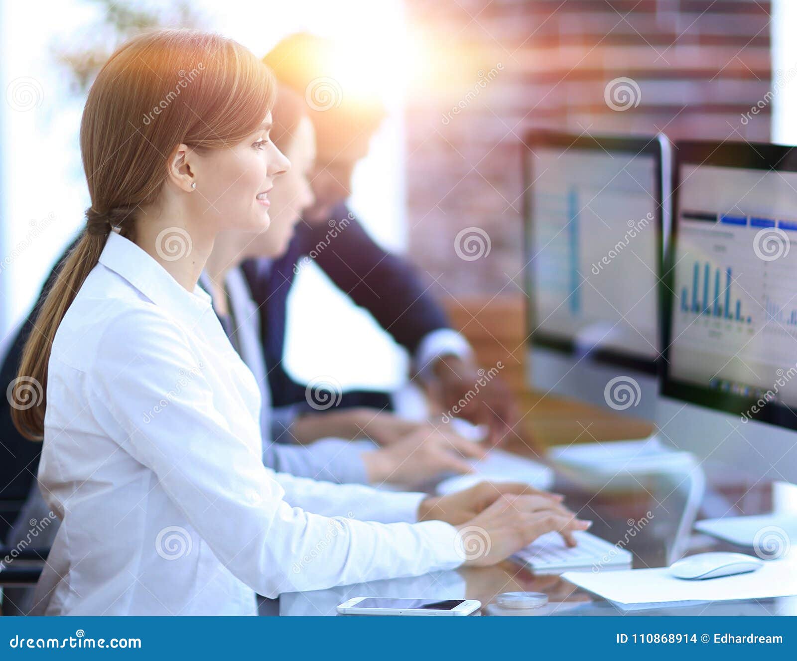 Business Team Working on Computers with Financial Data. Stock Photo ...