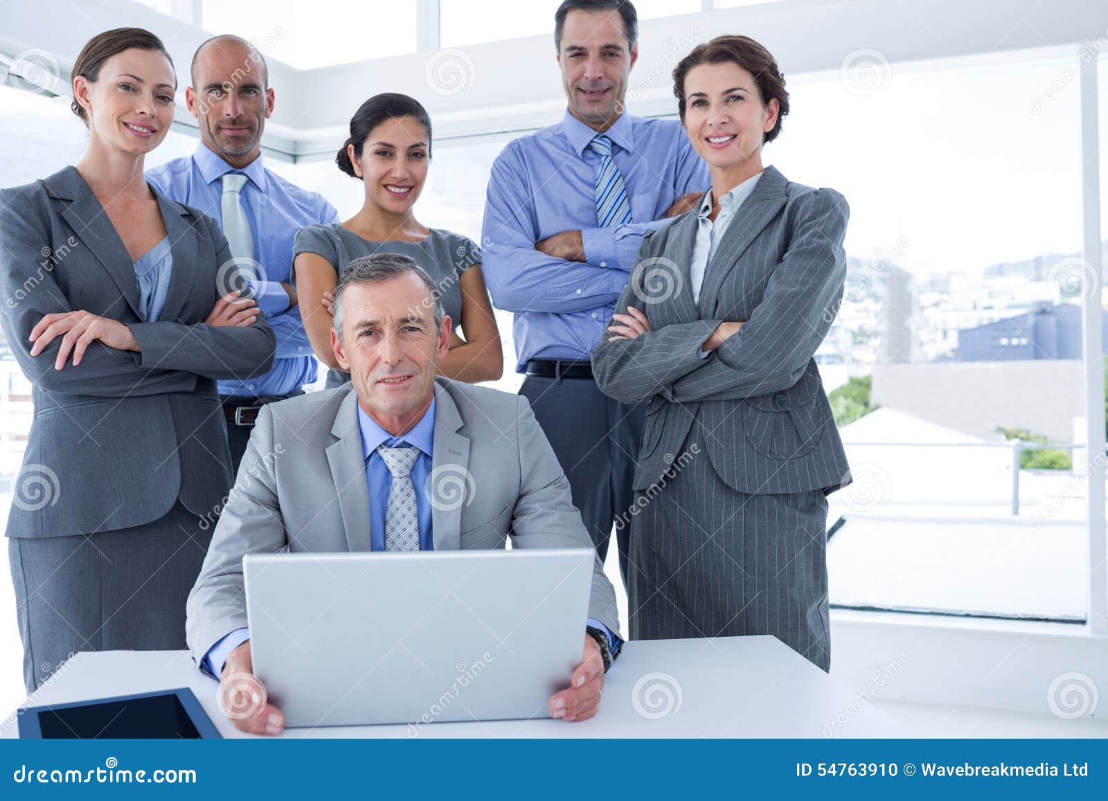 Business Team Working Happily Together on Laptop Stock Photo - Image of ...