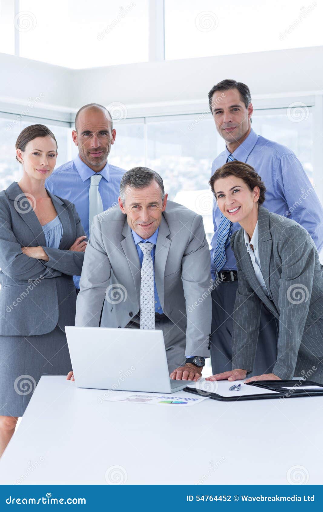Business Team Working Happily Together on Laptop Stock Photo - Image of ...