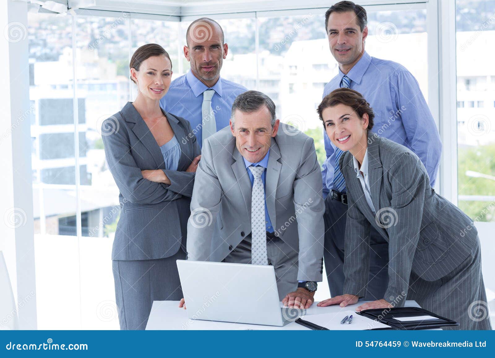 Business Team Working Happily Together on Laptop Stock Image - Image of ...