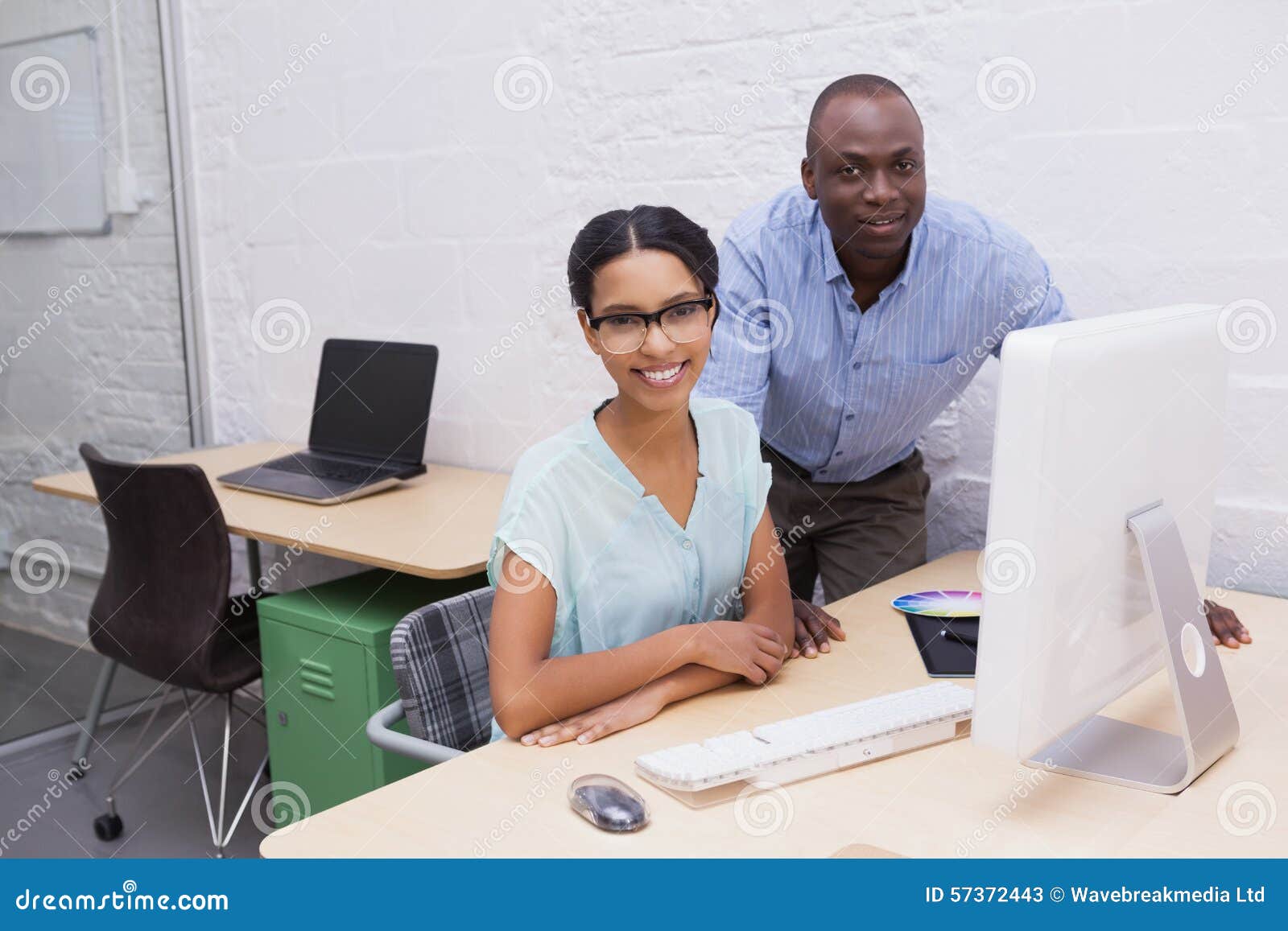 Business Team Working Happily Together on Laptop Stock Image - Image of ...