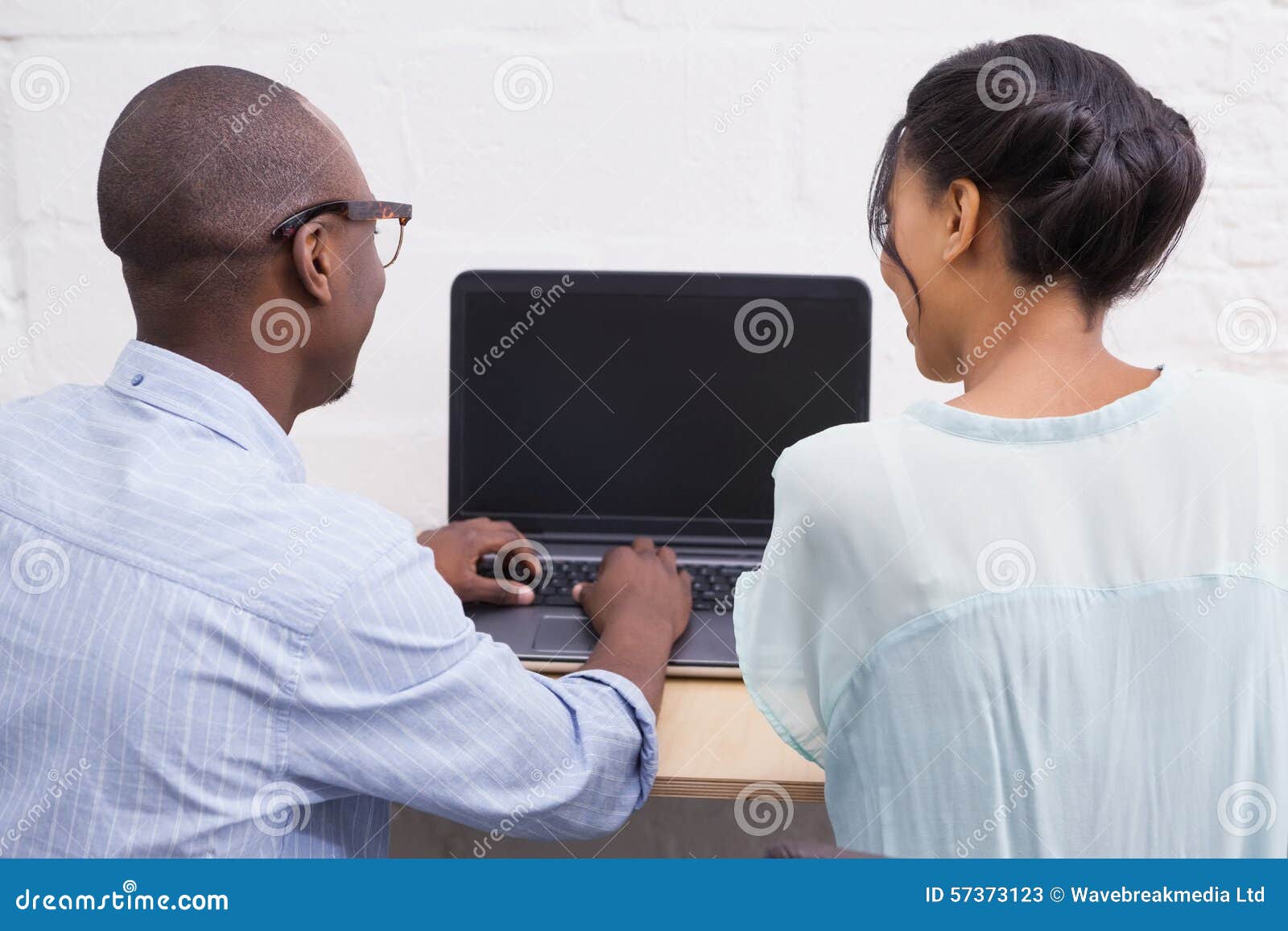 Business Team Working Happily Together on Laptop Stock Image - Image of ...