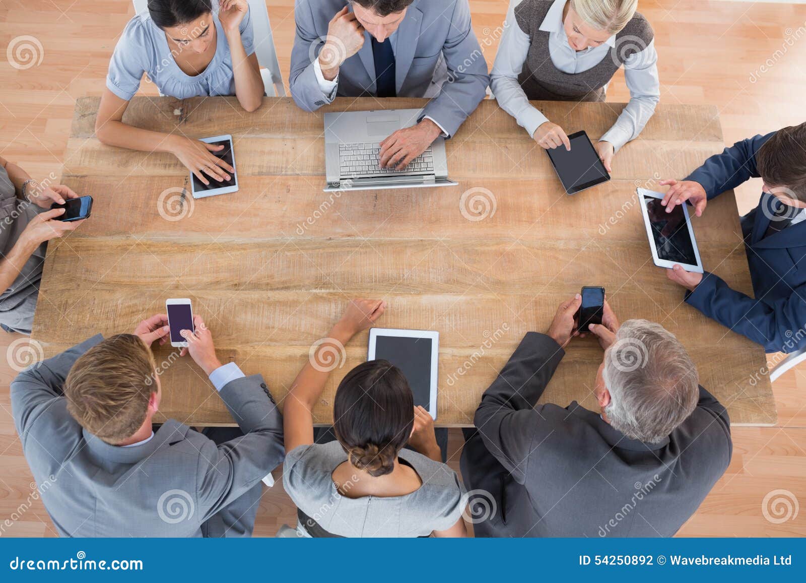 Business Team Working on Their Multimedia Devices Stock Photo - Image ...