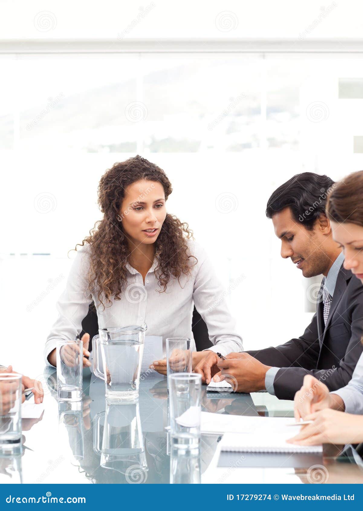 Business Team Working Together Around a Table Stock Photo - Image of ...