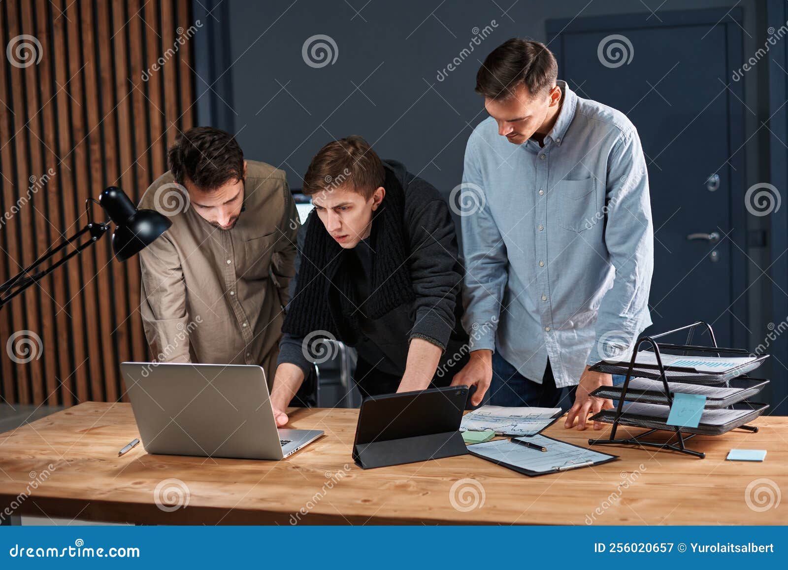 Business Team Working Works in the Office Late at Night. Stock Image ...