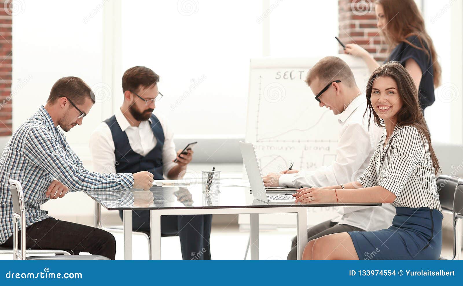 Business Team at the Workplace in the Office. Stock Photo - Image of ...