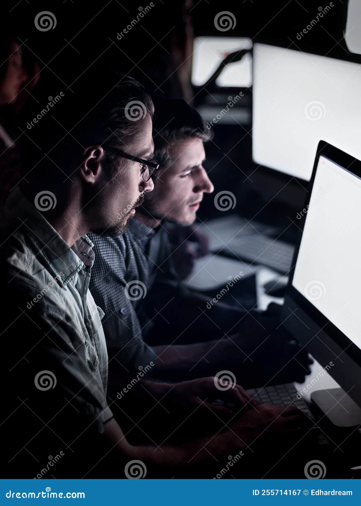Business Team Works on Computers at Night. Stock Image - Image of ...