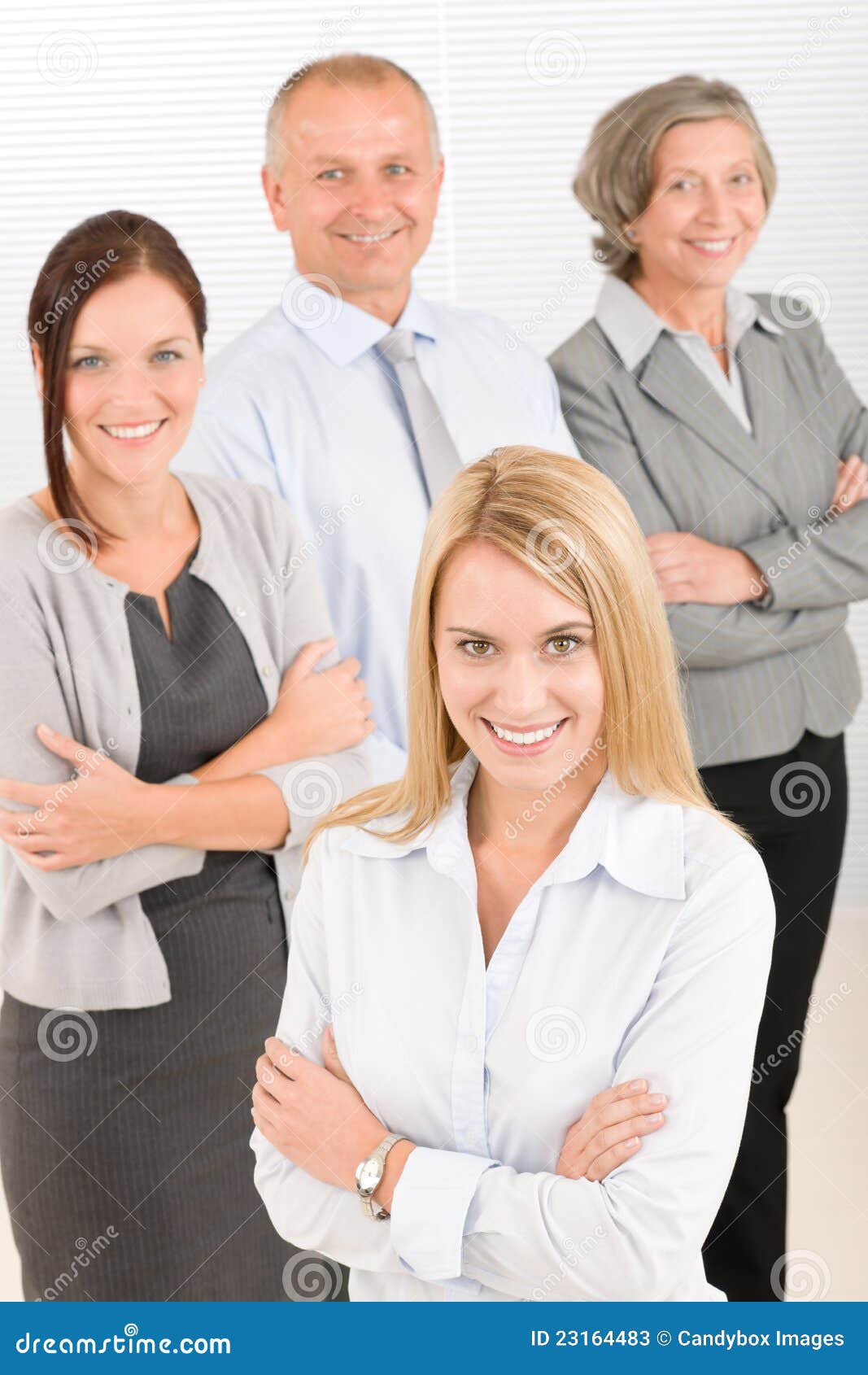 Business Team Young Woman With Mature Colleagues Stock Image Image Of
