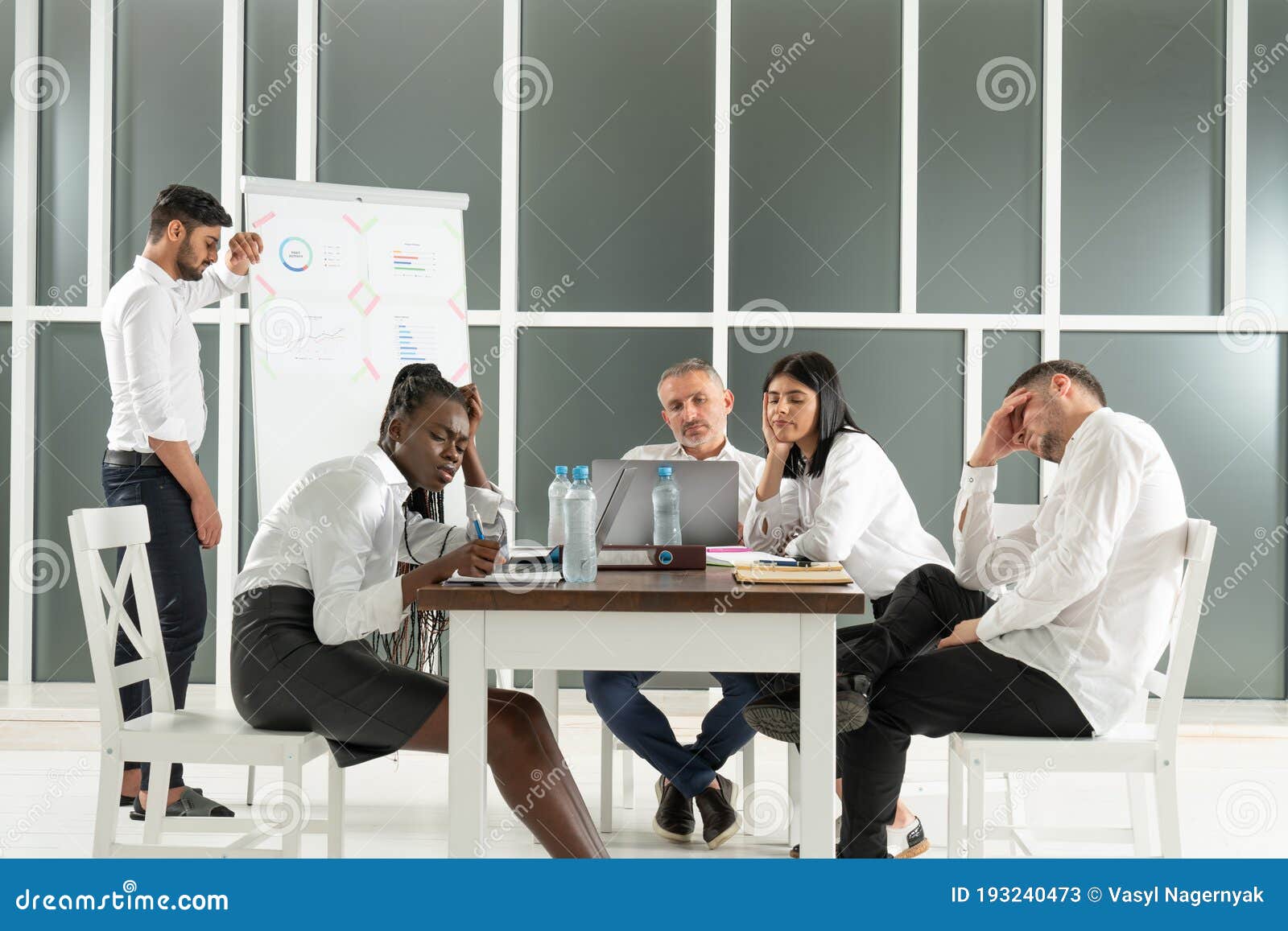 Business, Teamwork, People and Crisis Concept - Business Team Sitting ...