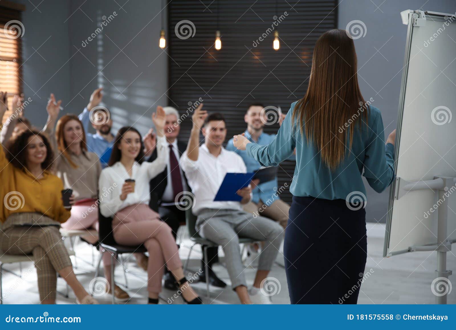 Business Trainer Answering Questions at Seminar in Hall Stock Photo ...