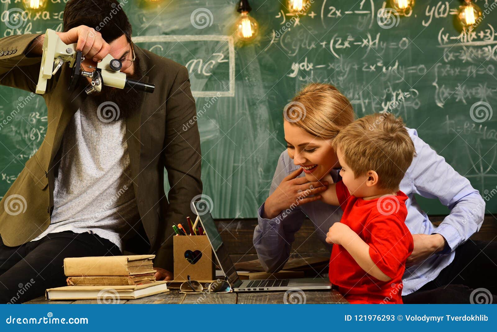 Business Tutor Typing on Laptop at Workplace in Classroom, Teacher Puts ...