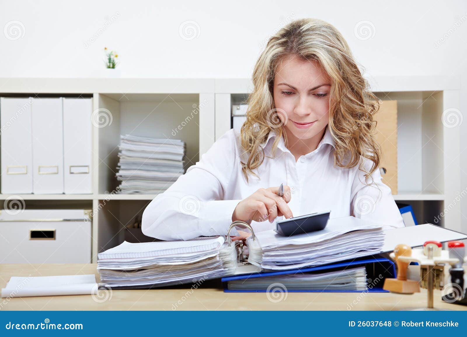 Business woman calculating stock photo. Image of career - 26037648