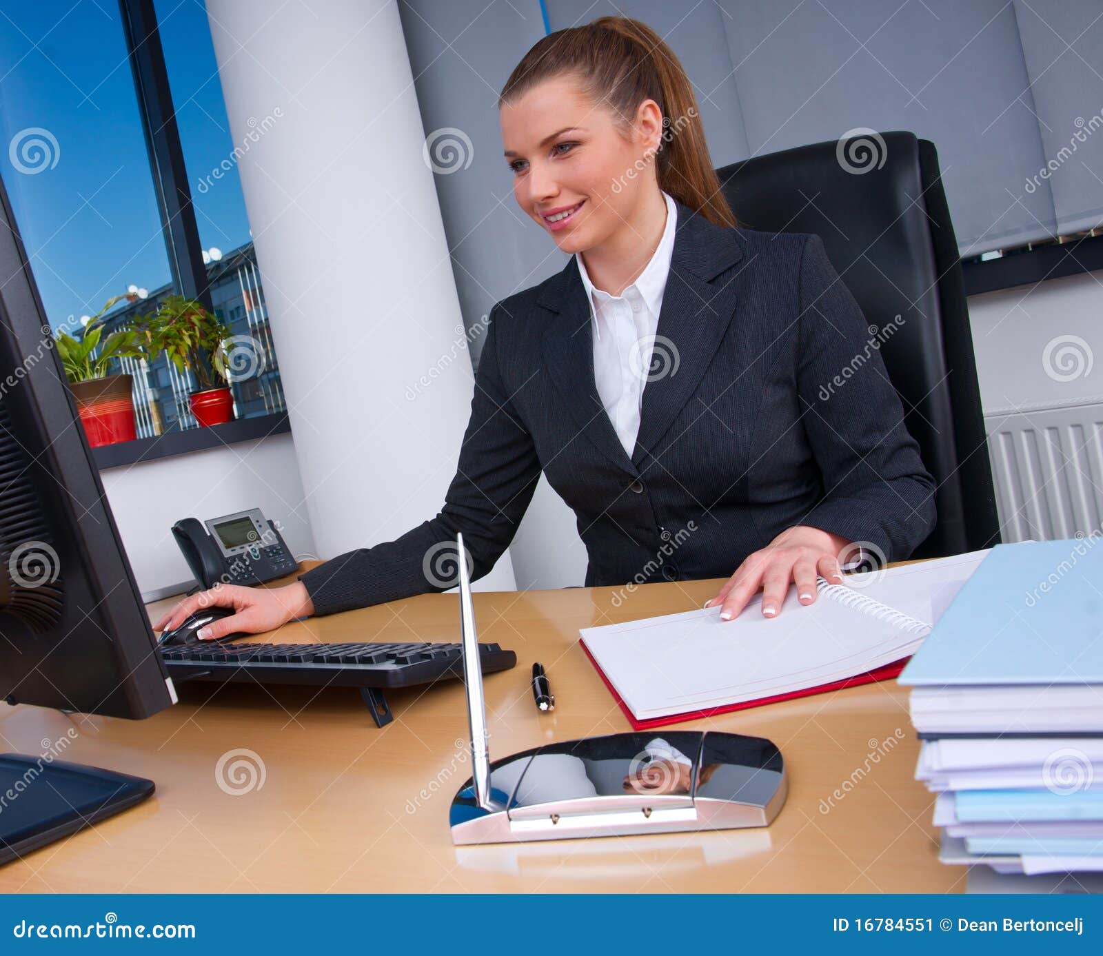 Business woman at computer stock image. Image of attractive - 16784551