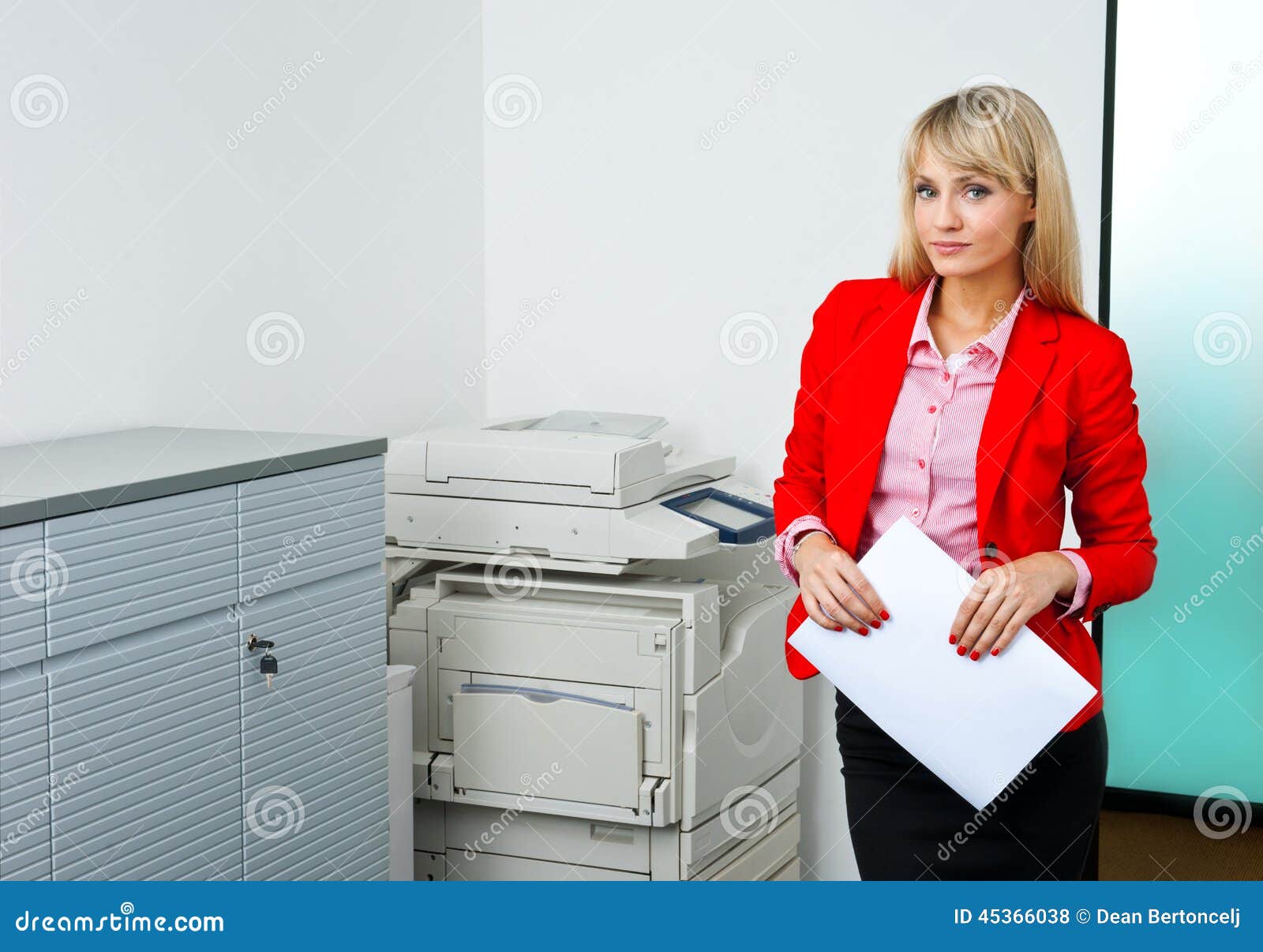Business Woman with Documents Standing Next To Printer Stock Photo ...