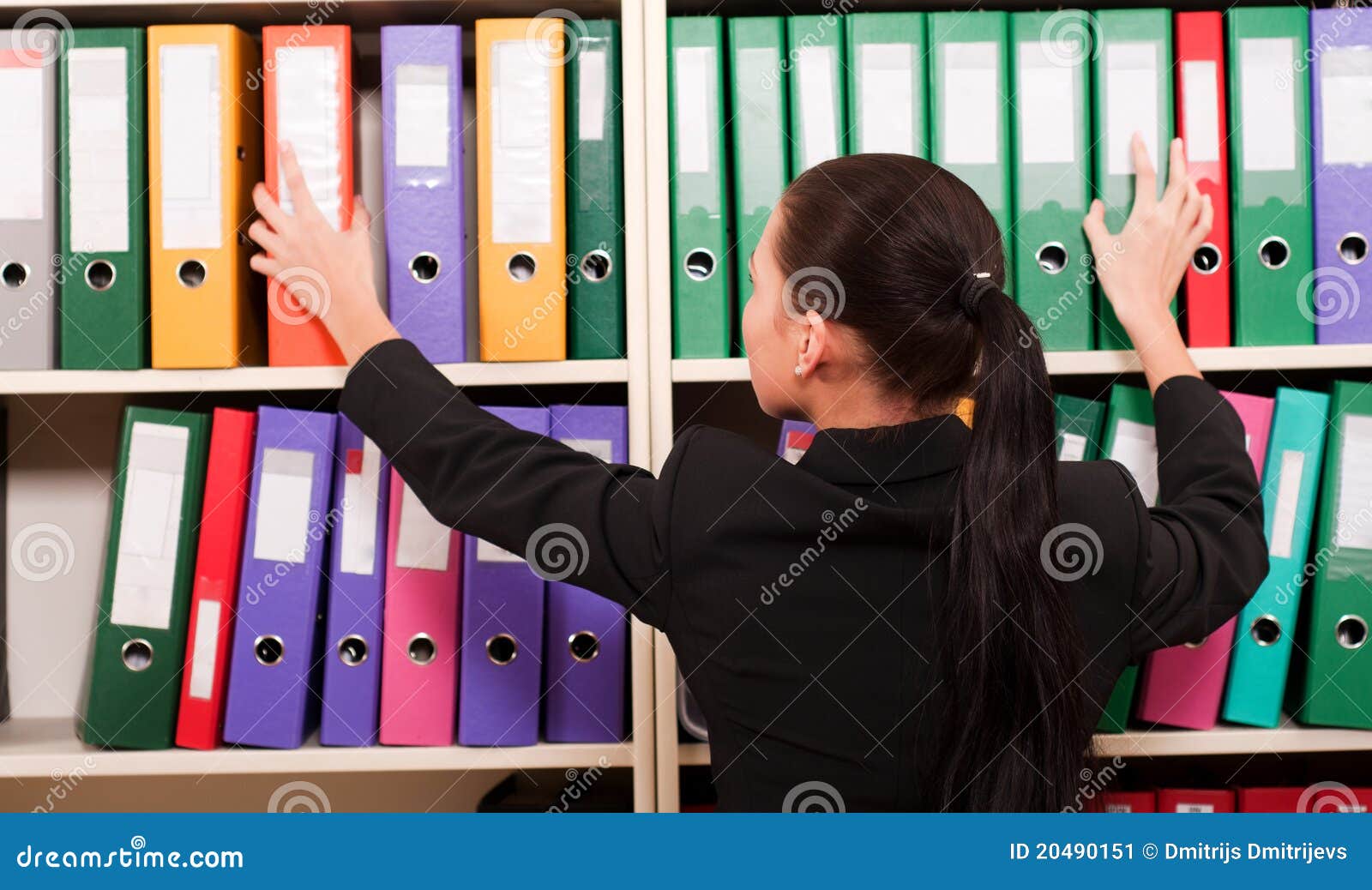 Business Woman in Front of Shelves with Folders Stock Image - Image of ... Business Woman in Front of Shelves with Folders Stock Image - Image of ...