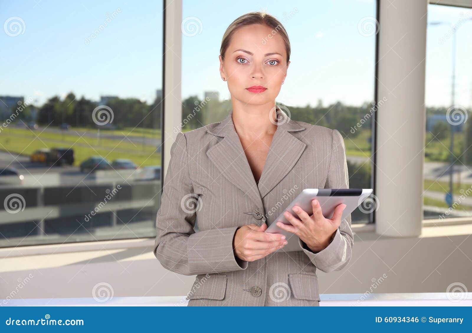 Business woman with gadget stock photo. Image of display - 60934346