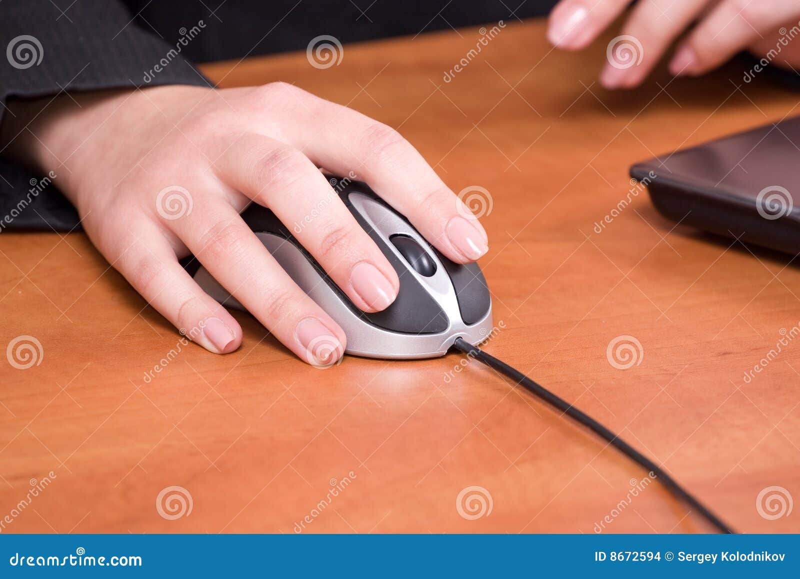 Business Woman Hand Working on a Computer Mouse at Stock Photo - Image ...