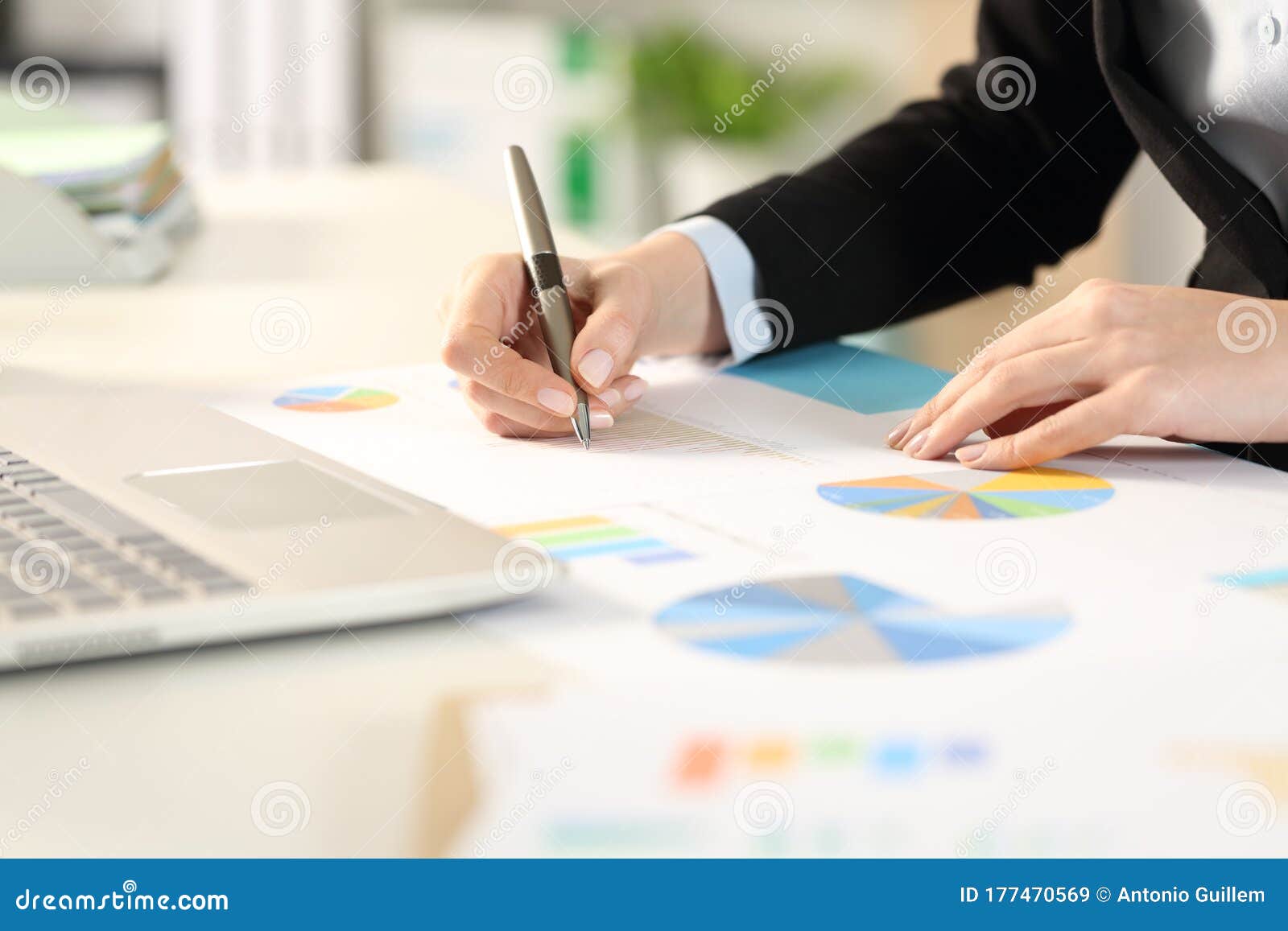 Business Woman Hands Comparing Graphs at the Office Stock Image - Image ...