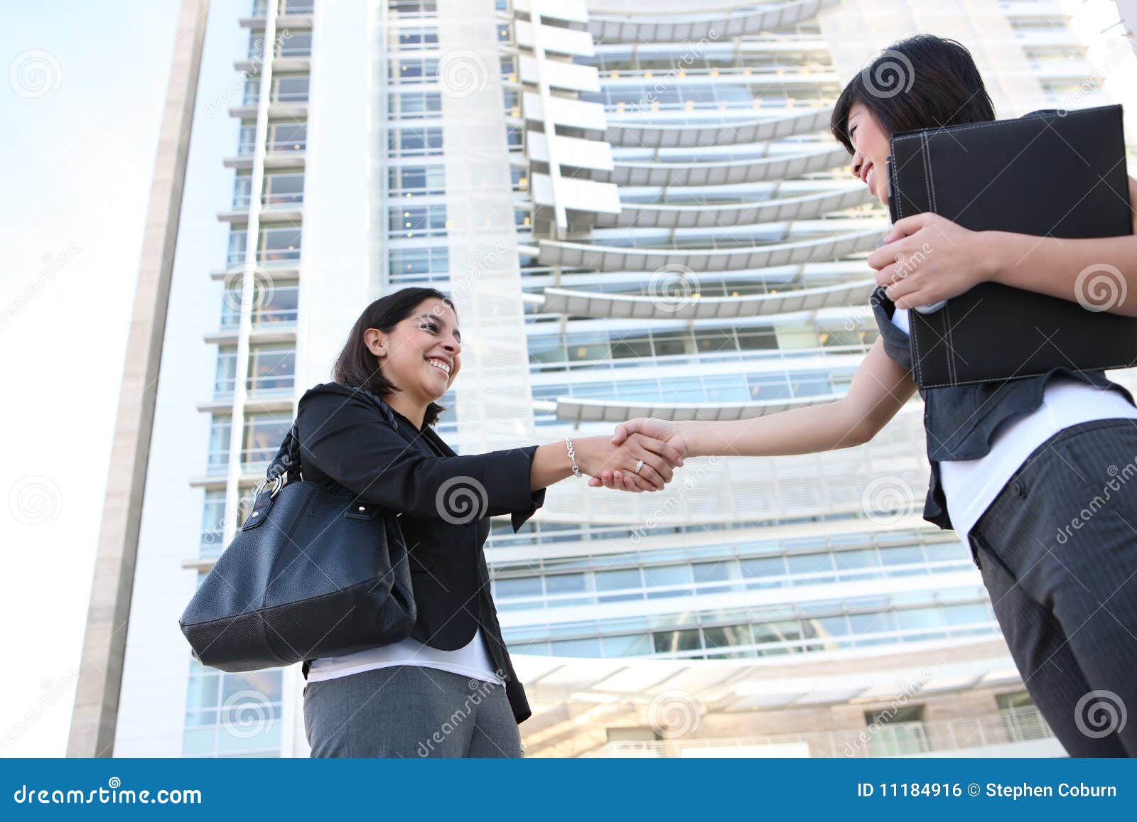 Business Woman Handshake stock photo. Image of group - 11184916