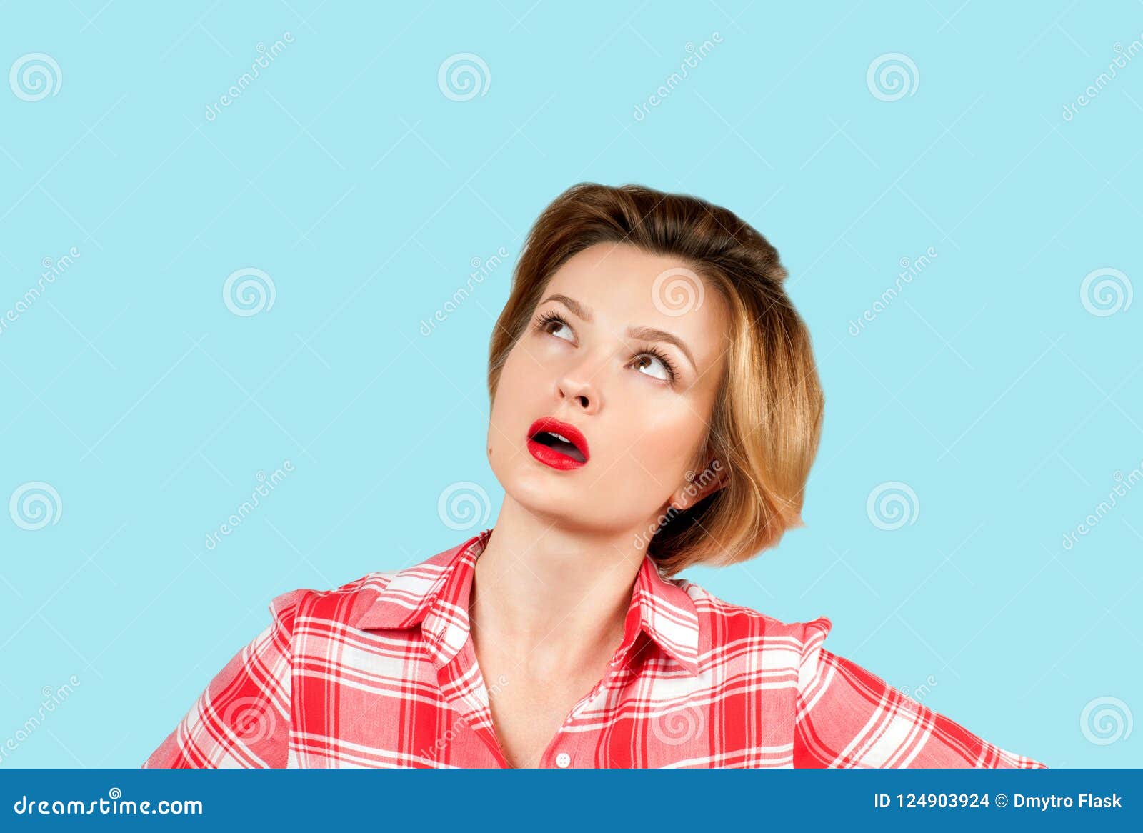 Business Woman with Questioning Face Expression Looking Up Stock Photo ...